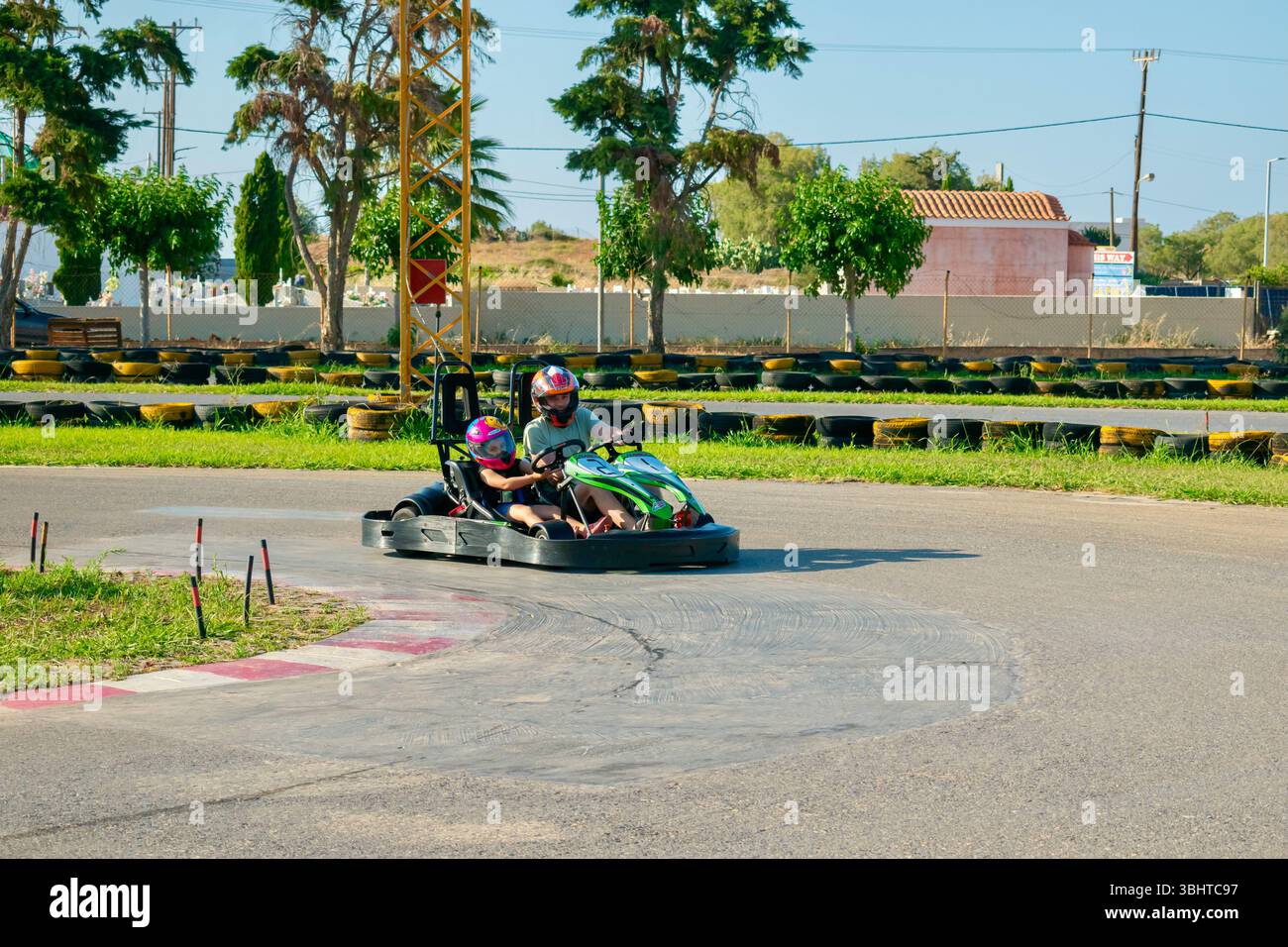 Malia, Crete, Greece. June 8, 2025. Kartland grand opening. Dad and ...