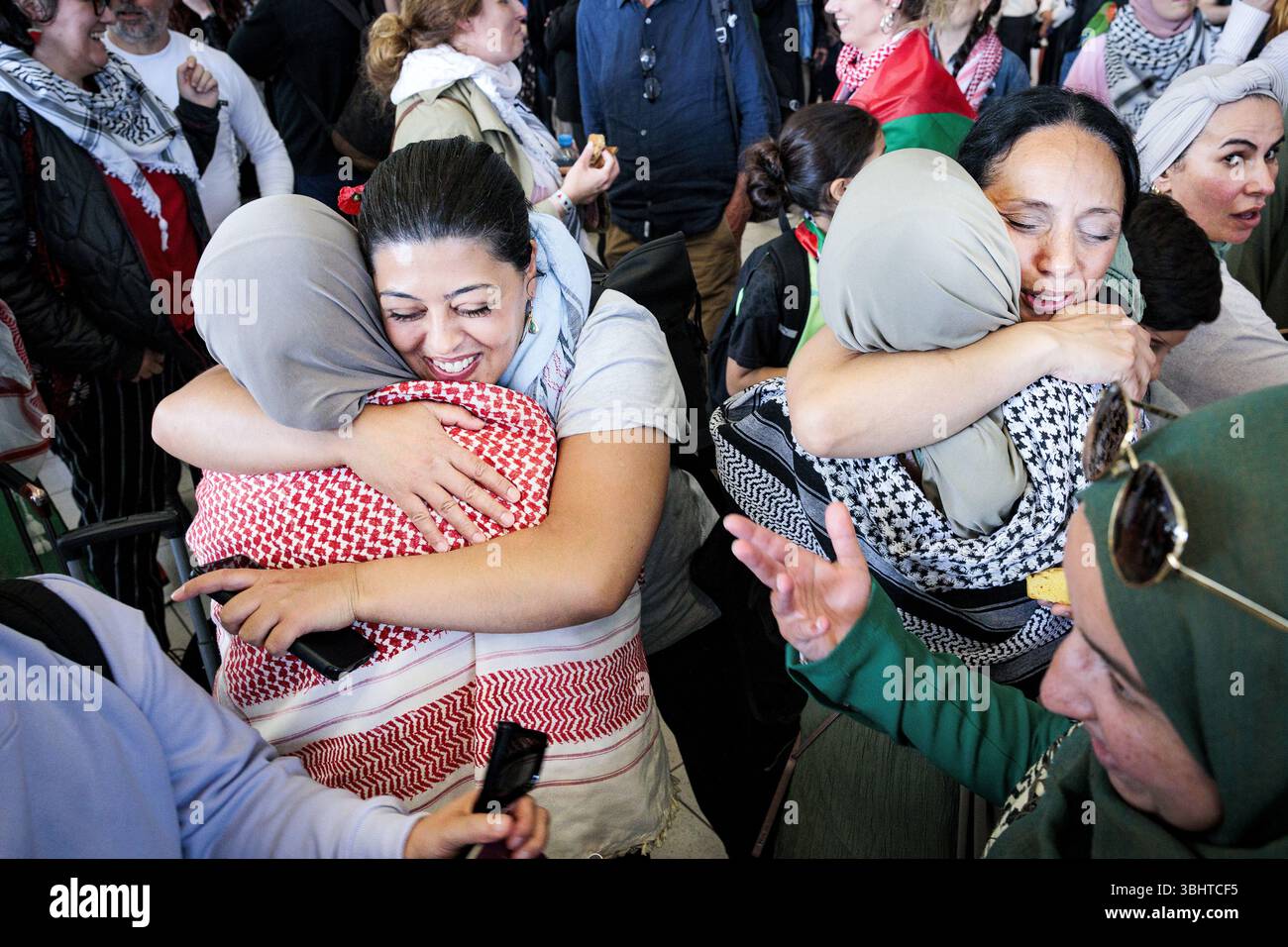 SCHIPHOL - Participants in the March to Gaza are waved goodbye as they ...