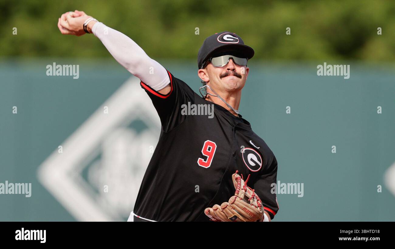 Georgia's Kolby Branch (9) throws to first base during an NCAA regional ...