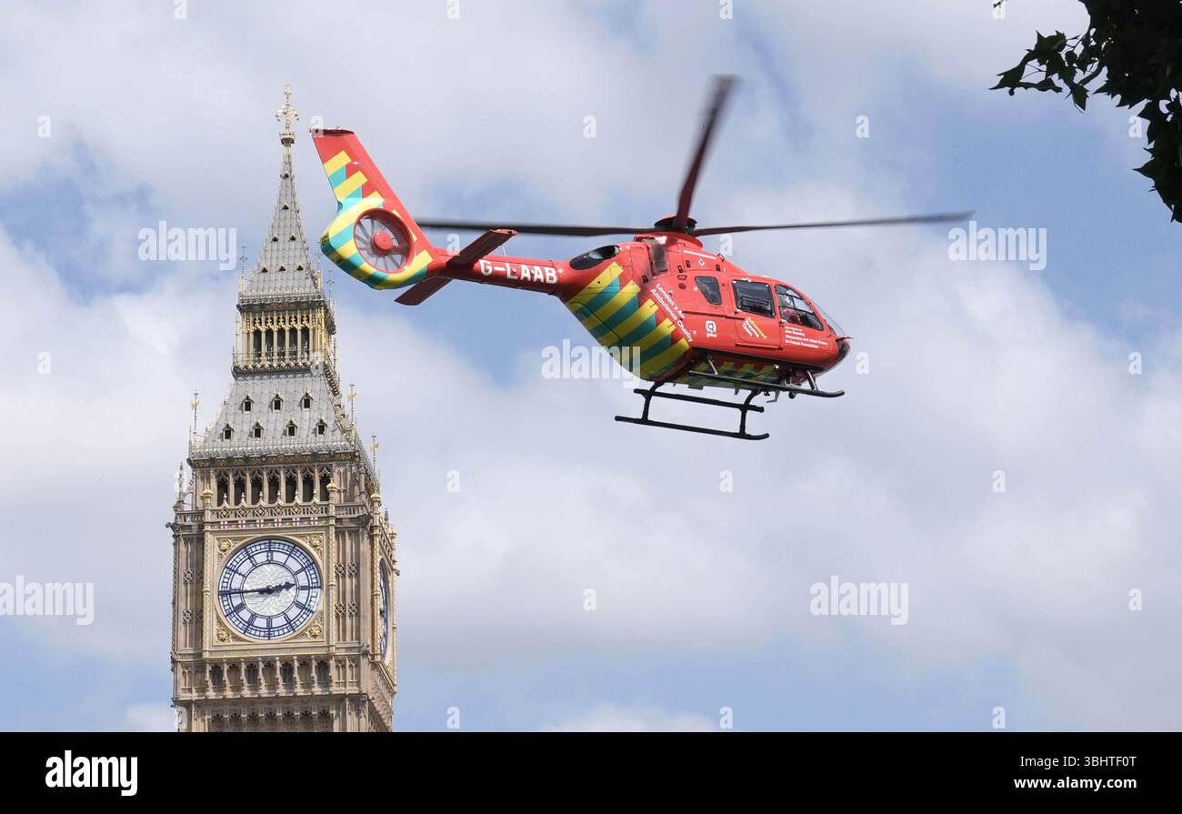 A London Air Ambulance helicopter takes off from Parliament Square in ...