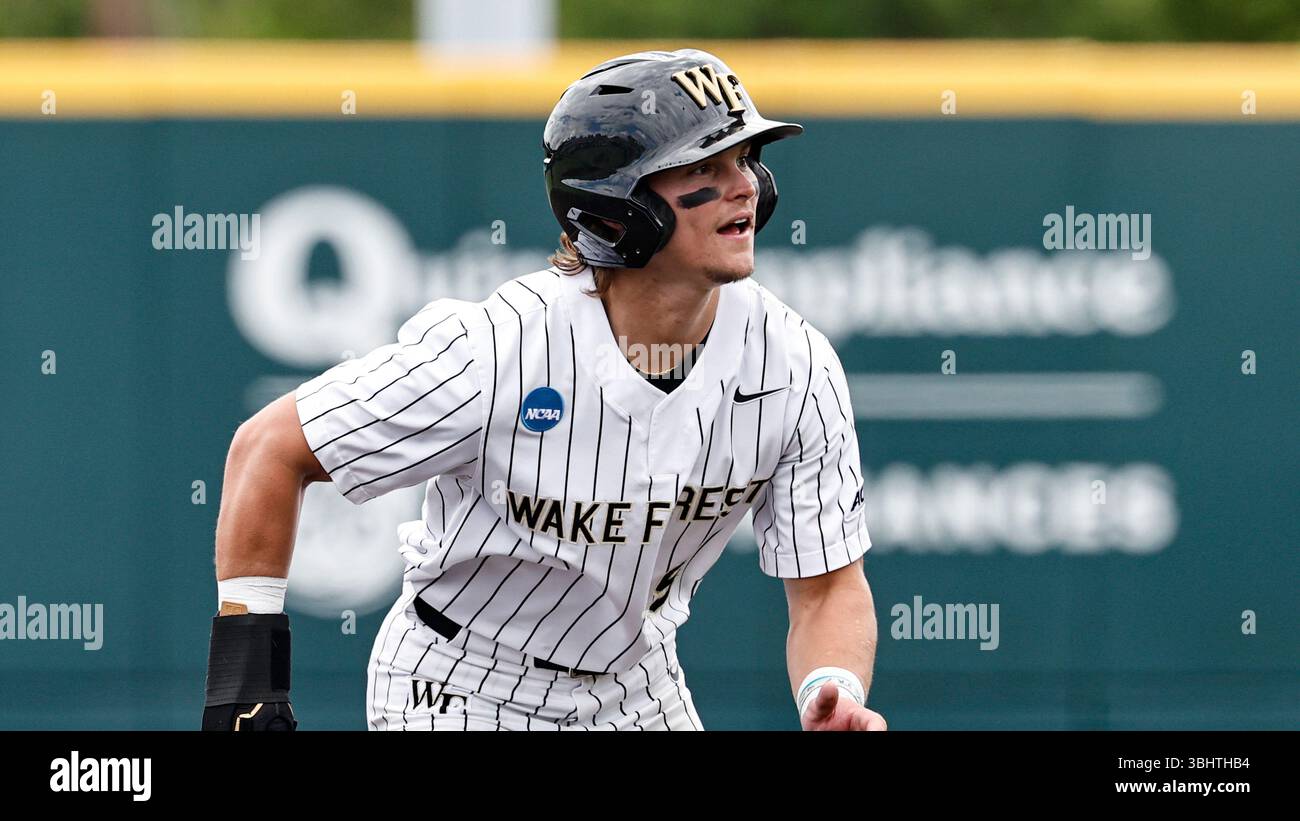 Wake Forest infielder Austin Hawke (9) runs to third base during an ...