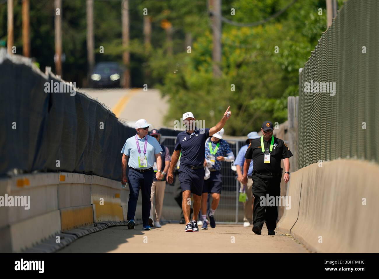 Dustin Johnson uses a pedestrian bridge over the Pennsylvania Turnpike ...