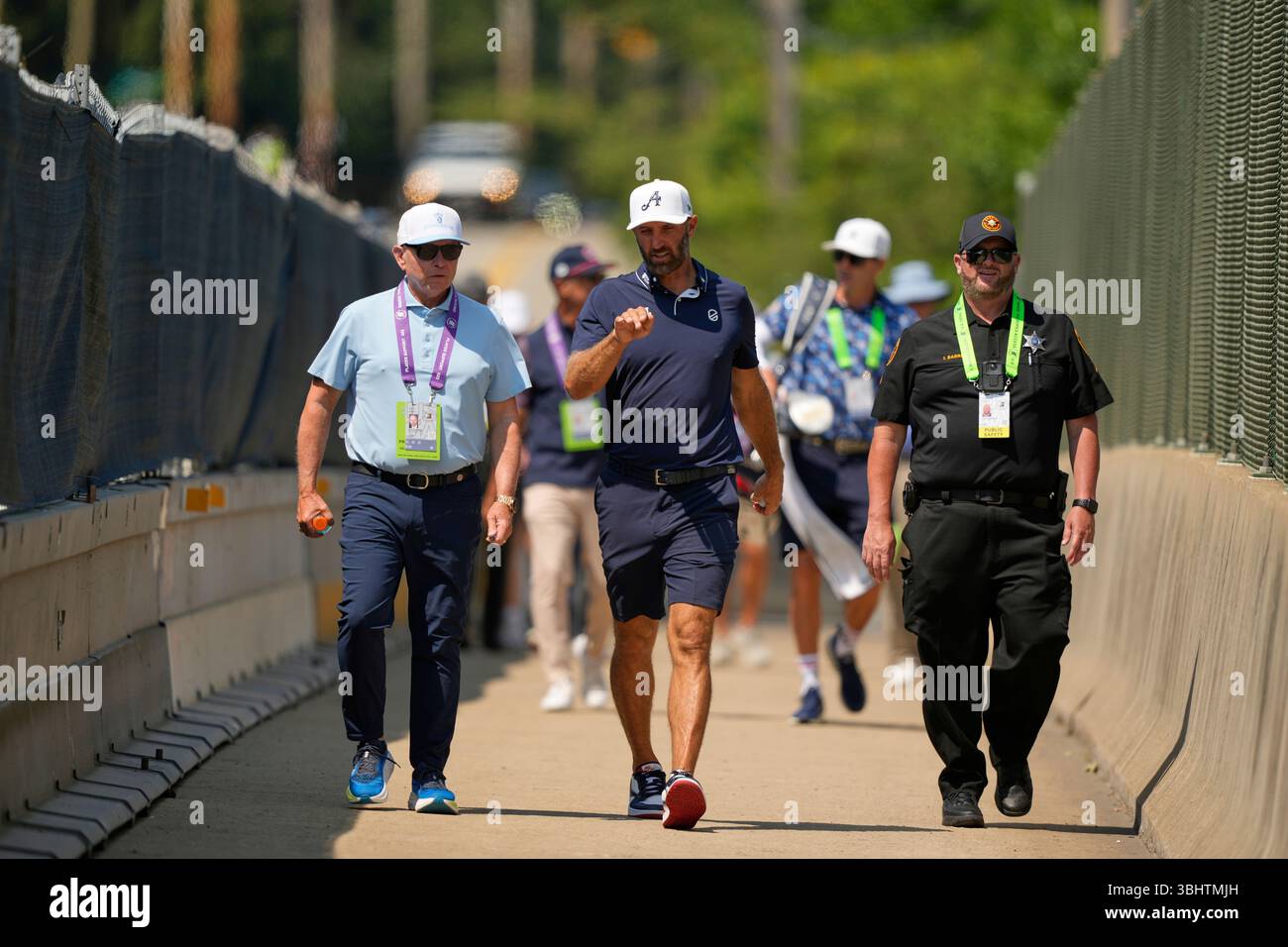 Dustin Johnson uses a pedestrian bridge over the Pennsylvania Turnpike ...