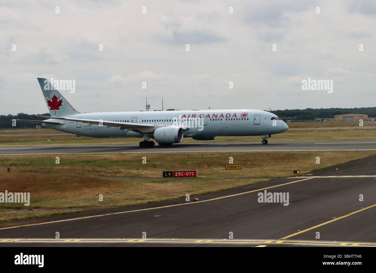 Air Canada plane crossing runway at Frankfurt International airport May ...