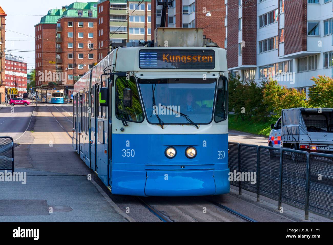 Traditional blue tram type M31 running along the street on May 13, 2025 ...