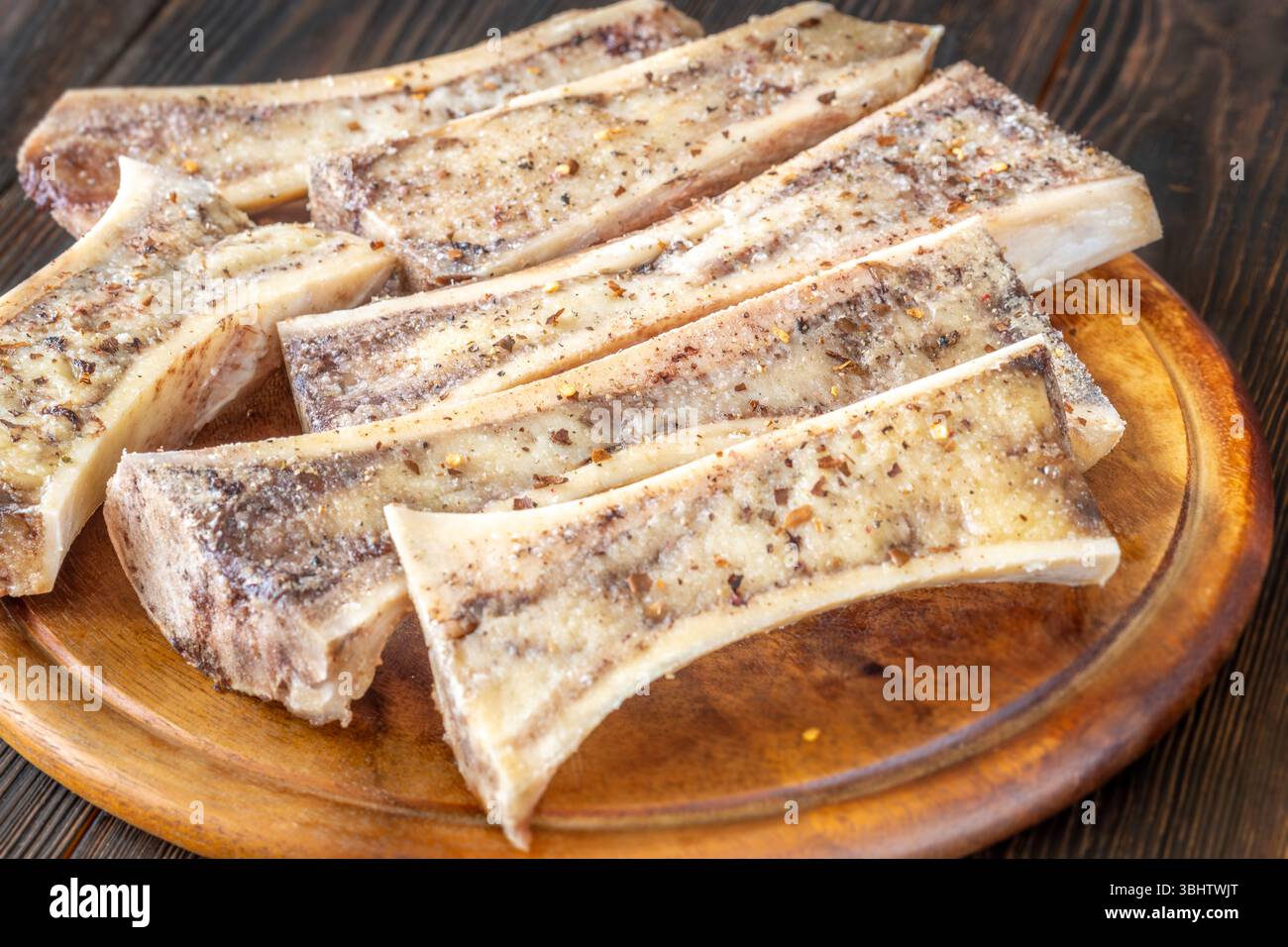 Halved bones baked to golden perfection, textures glisten with ...