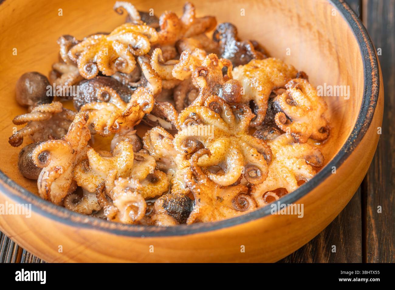 Tender baby octopuses crisped and fragrant, nestled warmly with crunchy ...