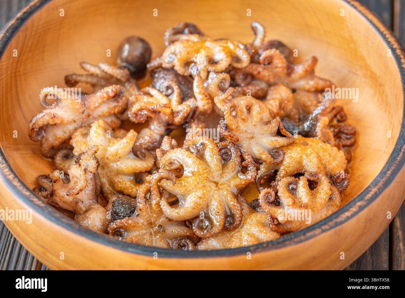 Tender baby octopuses crisped and fragrant, nestled warmly with crunchy ...