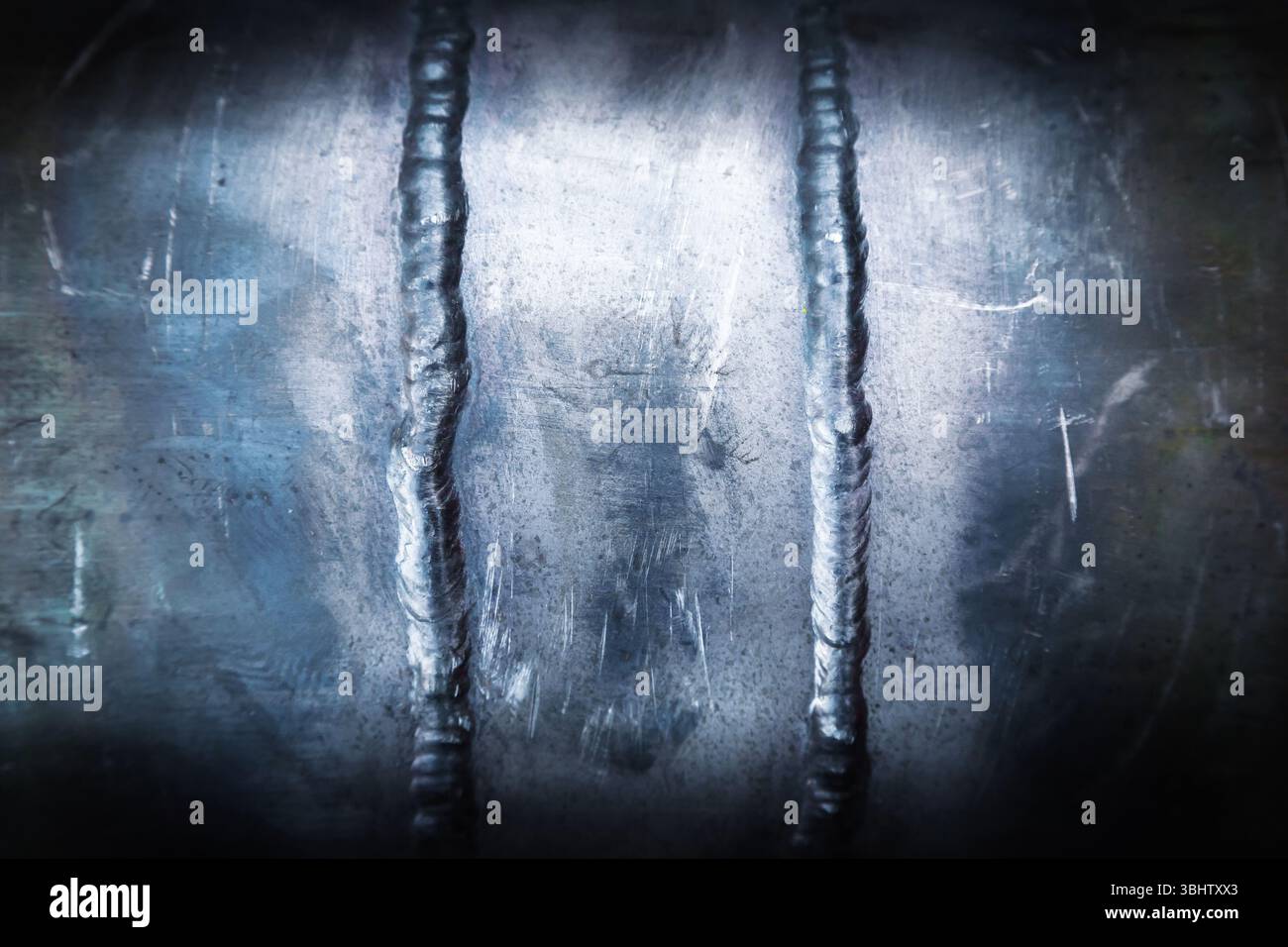 Two vertical welding seams on a steel pipe, close-up Stock Photo - Alamy