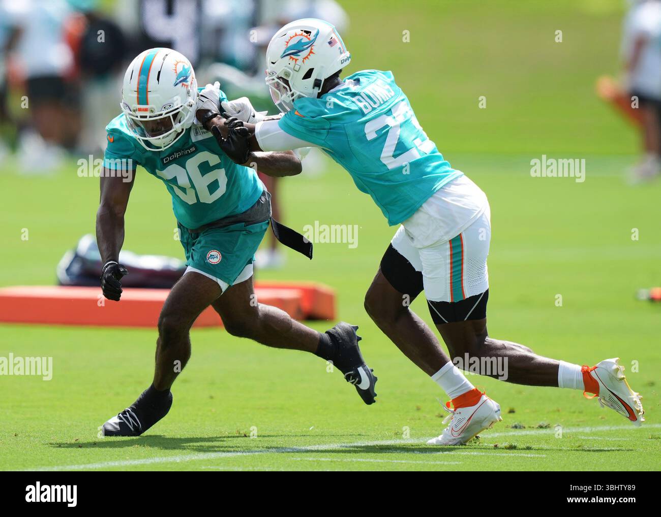 Miami Dolphins cornerback Storm Duck (36) and cornerback Artie Burns ...