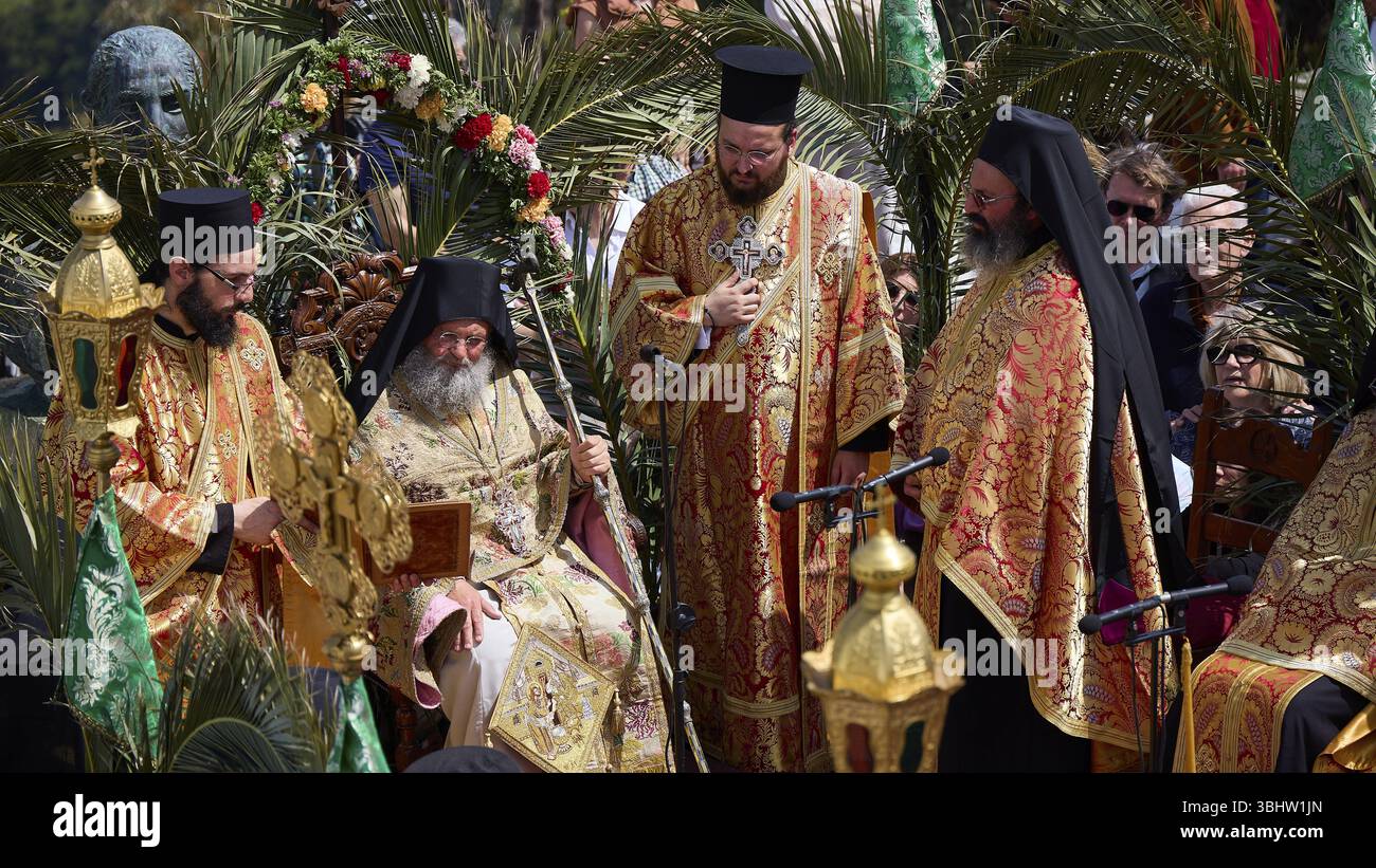 Orthodox priests in elaborate robes gather during a solemn religious ...