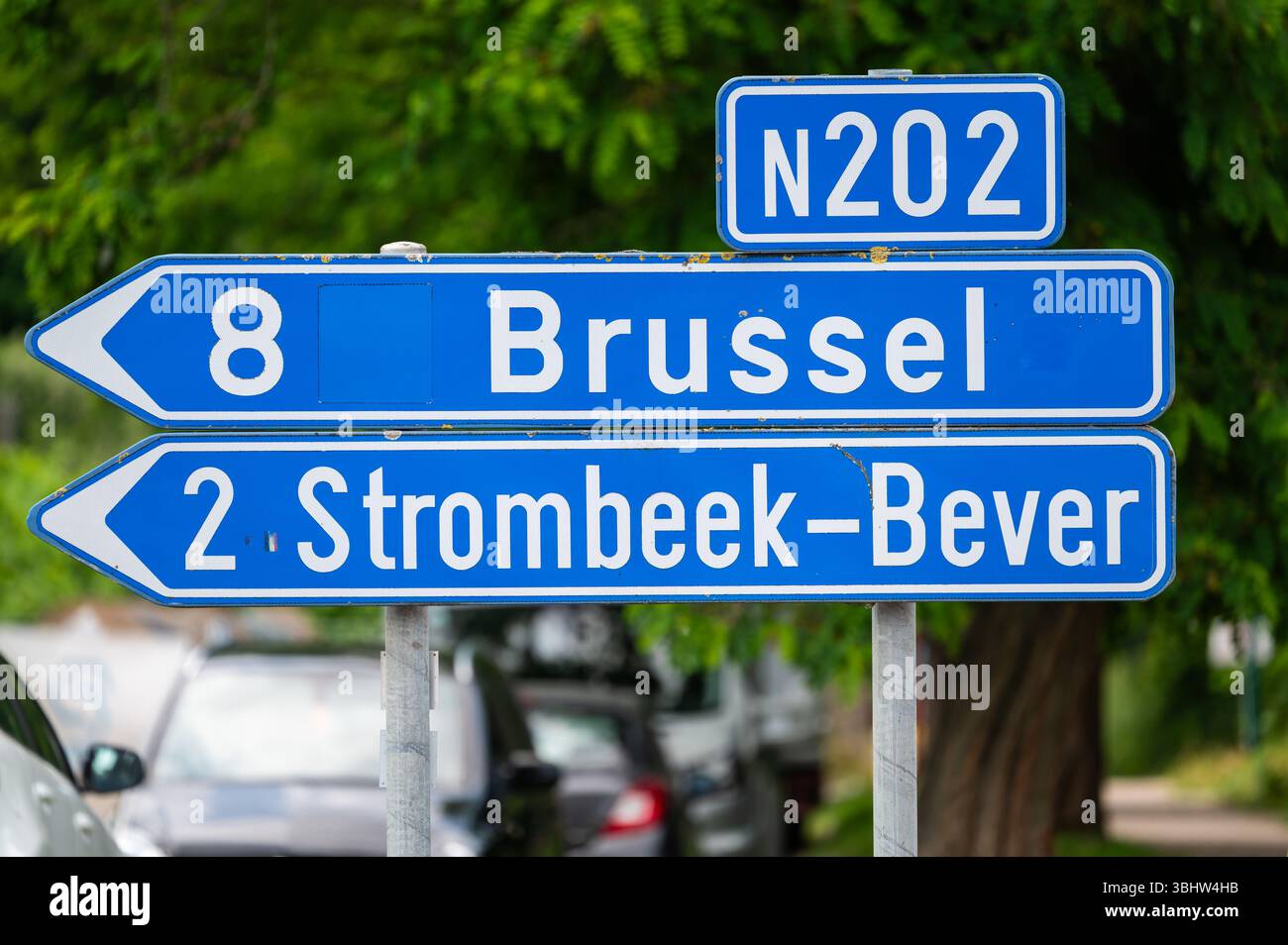 National road N 202 with direction signs to Brussels and Strombeek ...