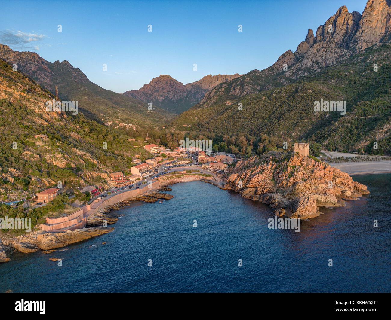 Aerial view town and ruins of the Genoese tower of Porto, Corsica ...