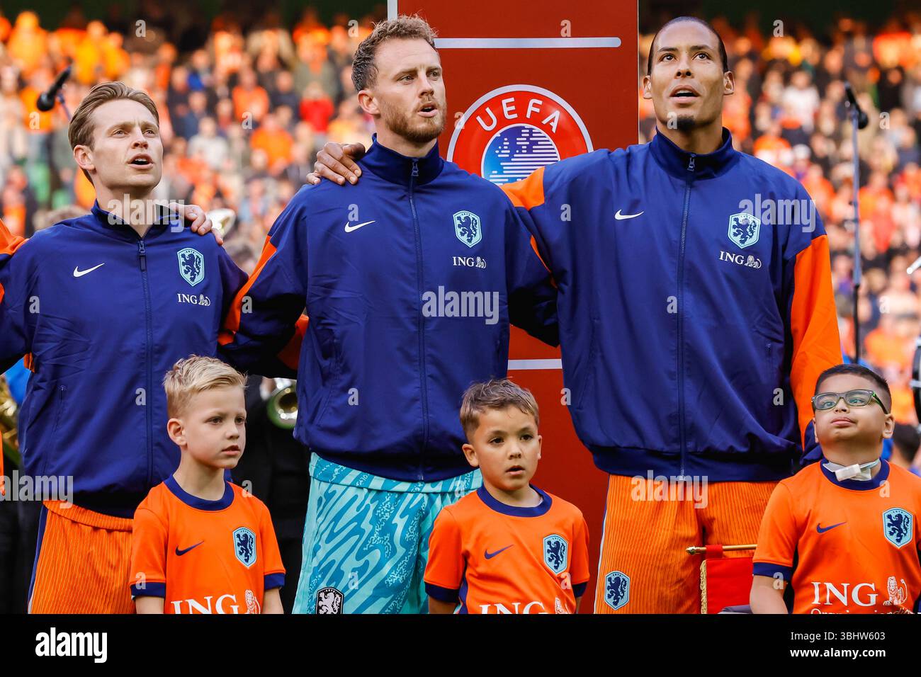 Groningen - Frenkie de Jong of The Netherlands, Mark Flekken of The ...