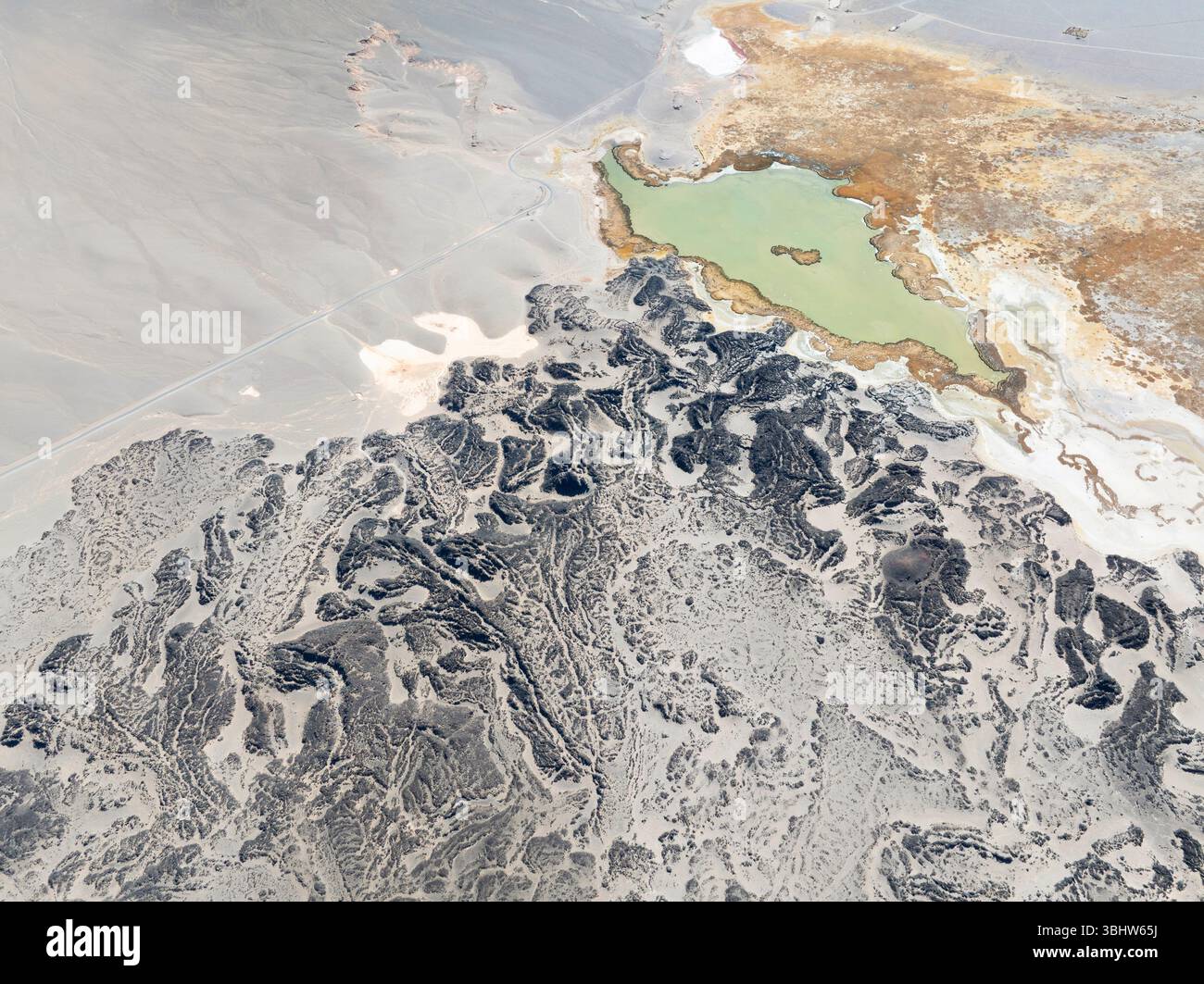 Aerial view of the Antofagasta lagoon and lava field of the volcano ...