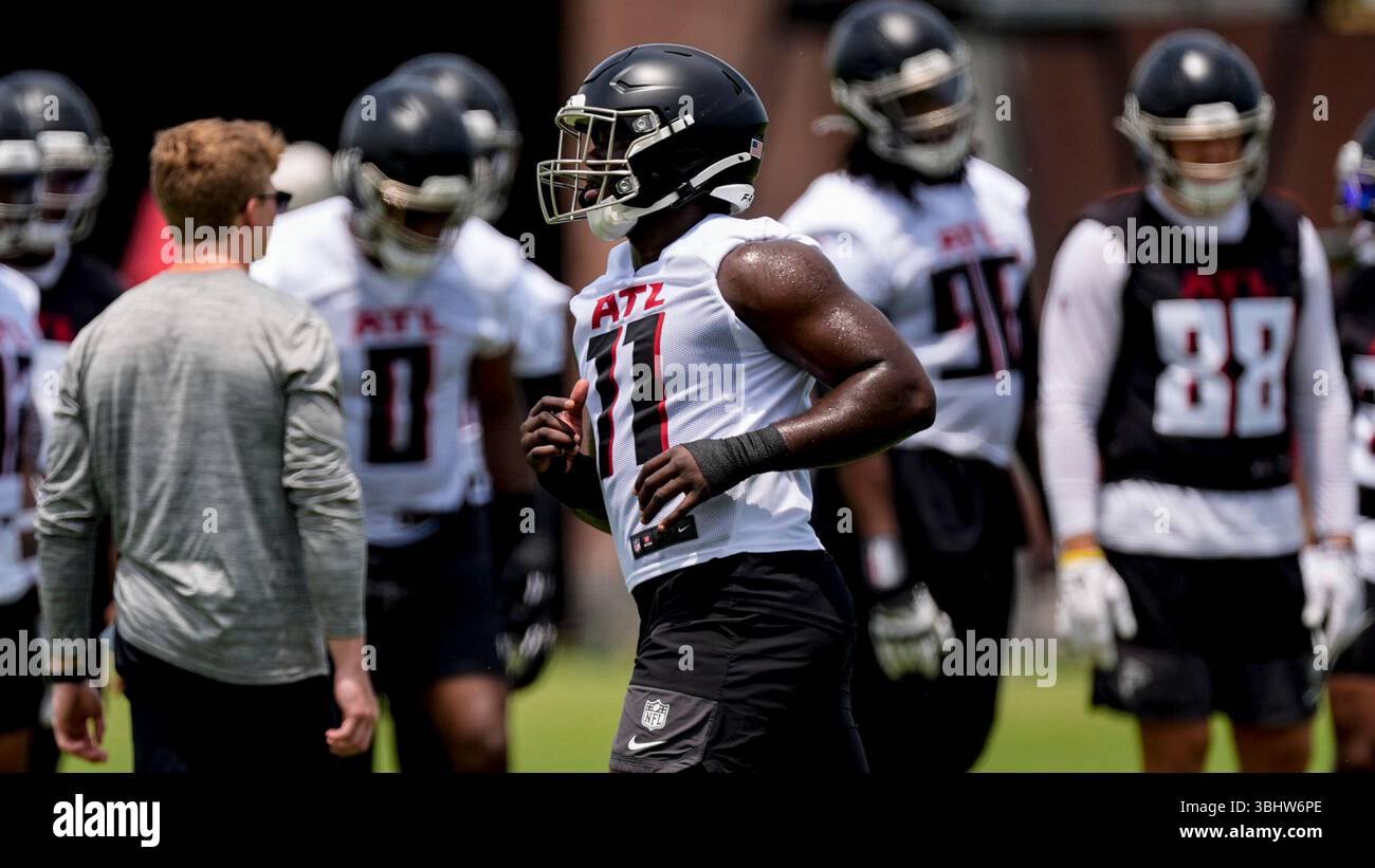 Atlanta Falcons linebacker Jalon Walker (11) works out during practice ...