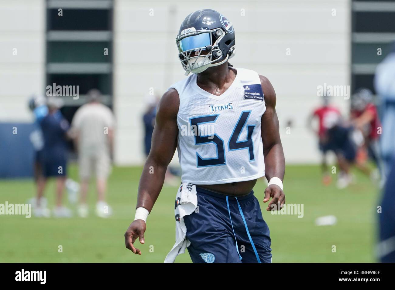 Tennessee Titans linebacker Lorenzo Carter (54) moves to the next drill ...