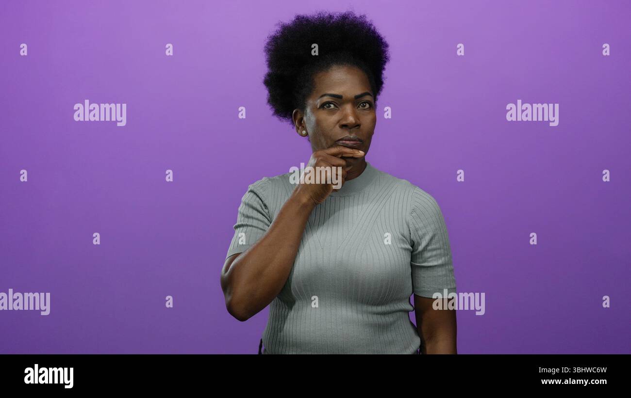 Woman thinking deeply stands hi-res stock photography and images - Alamy