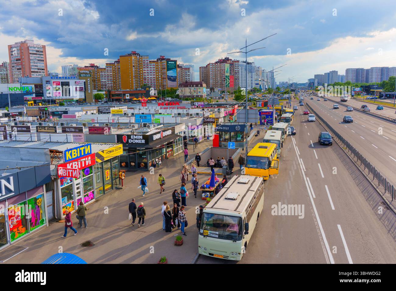 Kyiv, Ukraine - May 19, 2025: People are boarding a bus at Poznyaky ...
