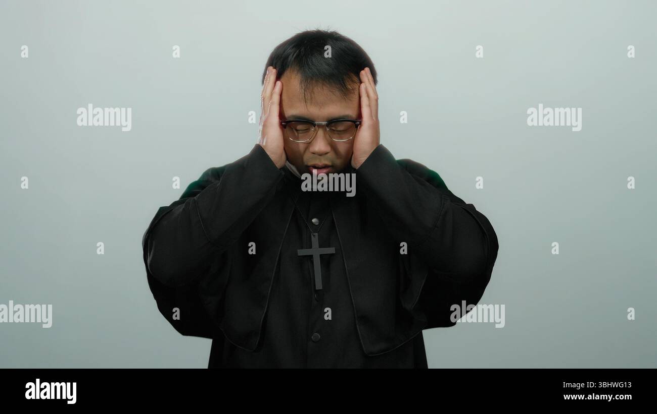 Asian man in priest attire hi-res stock photography and images - Alamy