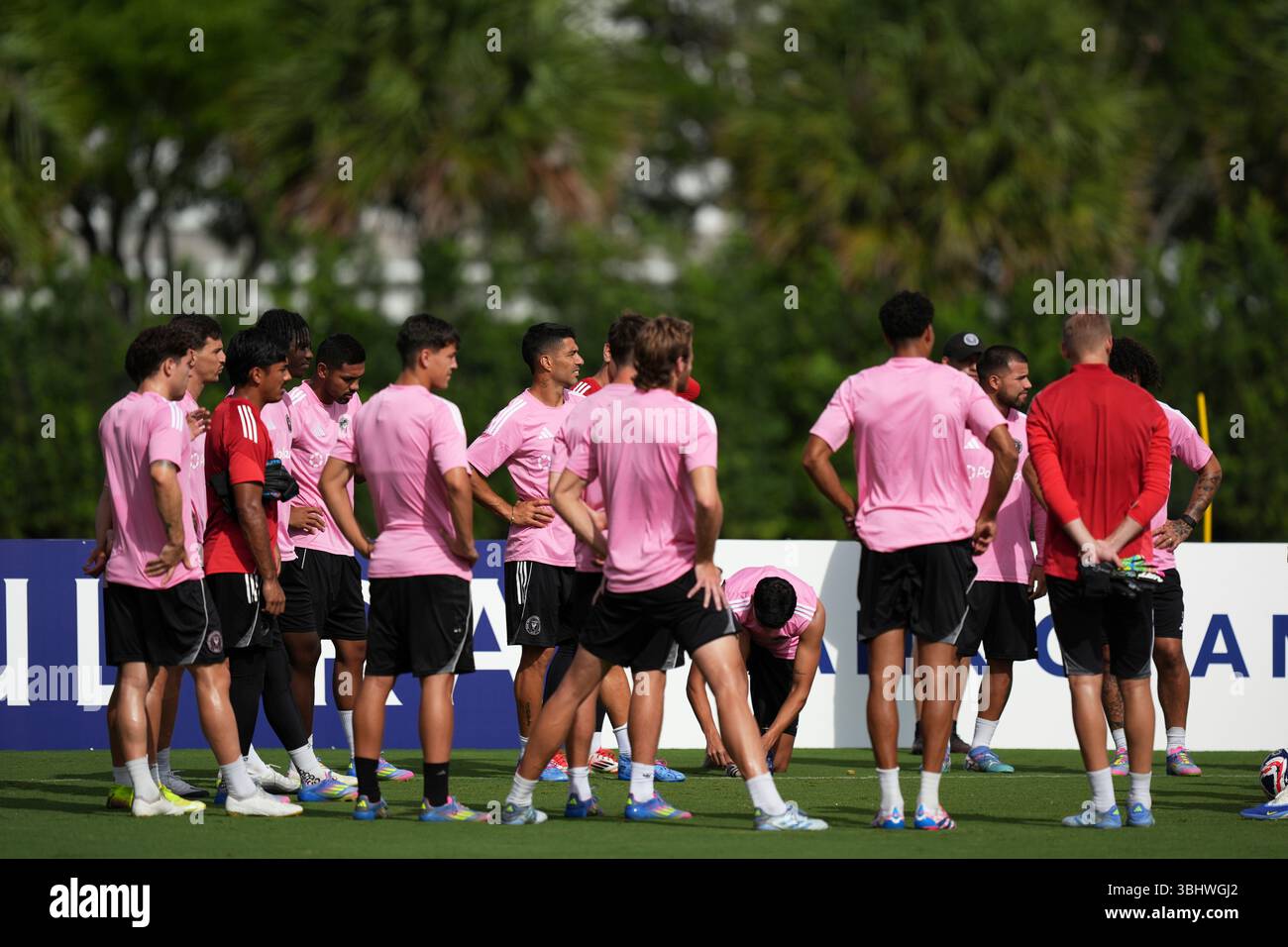 Inter Miami players including forward Luis Suarez, center left, gather ...