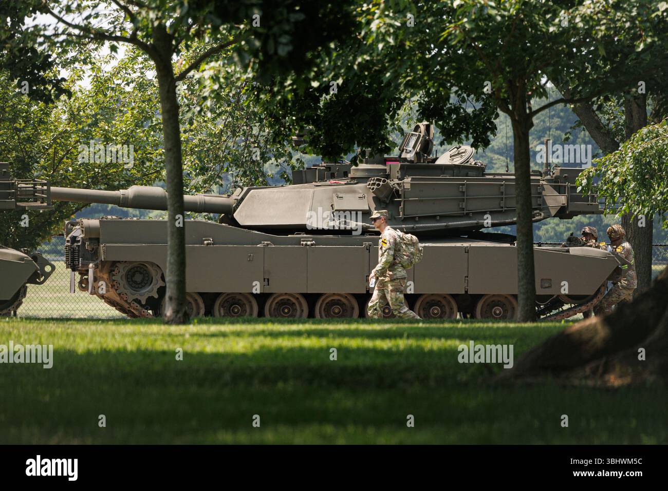 Washington, United States. 11th June, 2025. A solider walks past an M1 ...