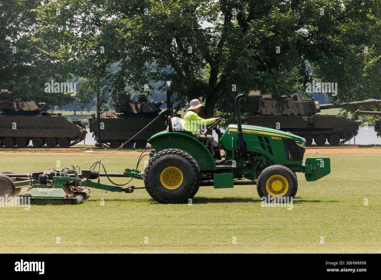 Washington, United States. 11th June, 2025. A landscaper mows the grass ...