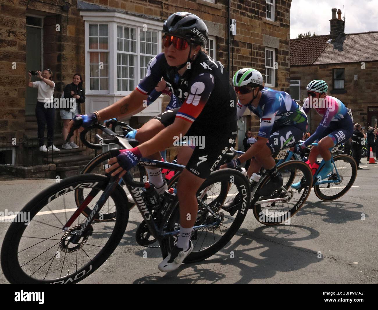 Riders in the peloton compete during Stage 1 of the 2025 Lloyds Bank ...
