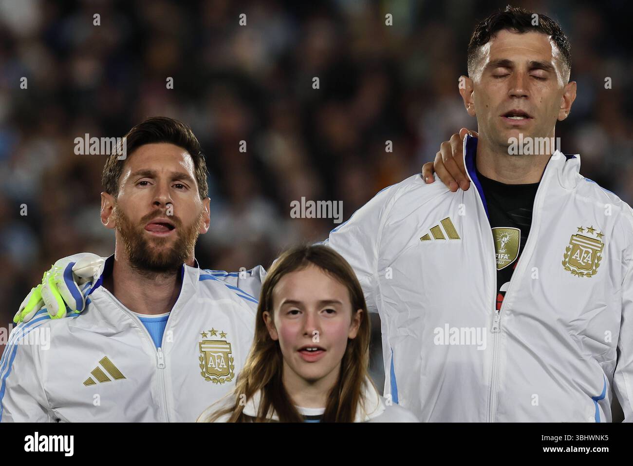 Argentinas national team forward Lionel Messi L and goalkeeper Emiliano ...