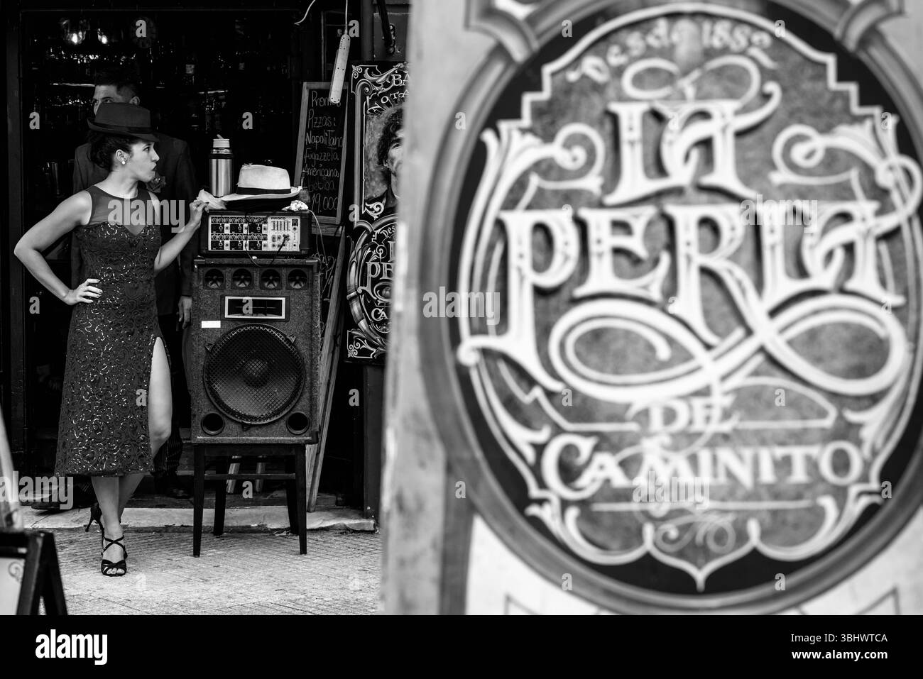 A Female Tango Dancer Waiting Outside La Perla Cafe/Restaurant, La Boca ...