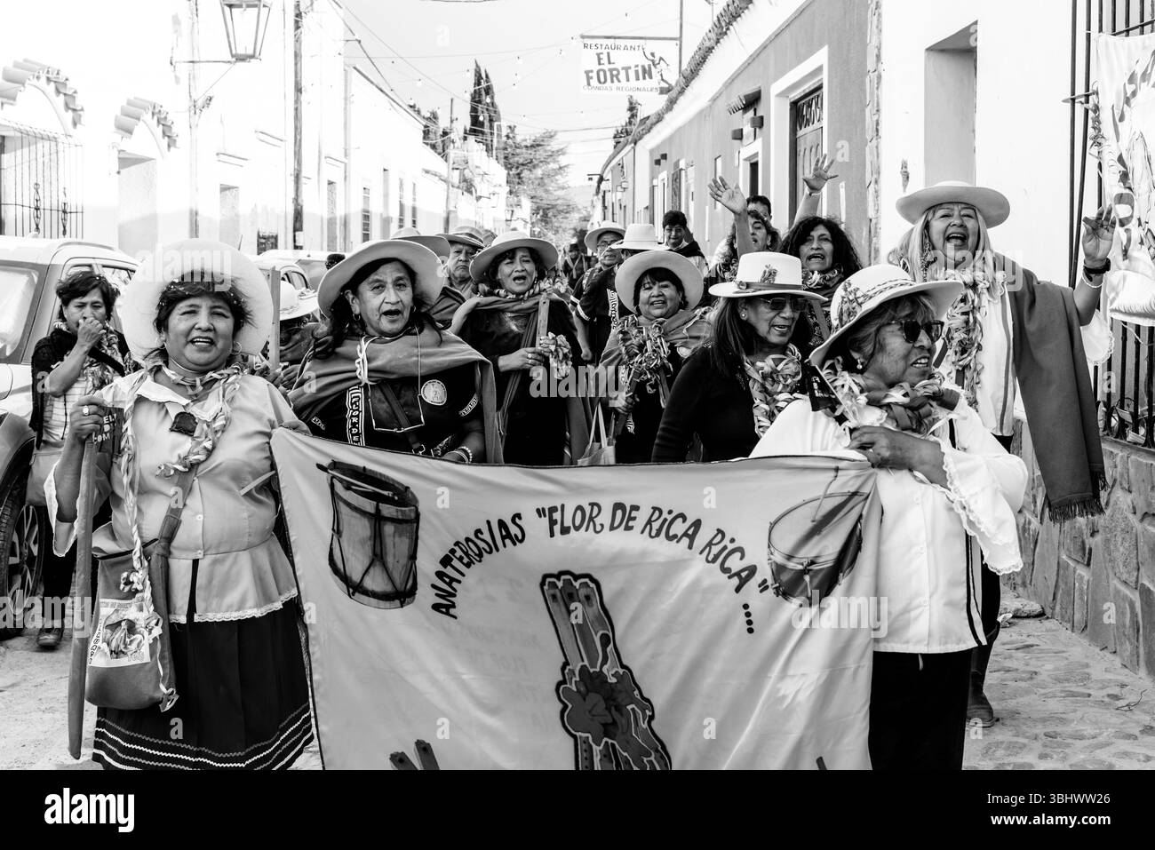 A Group Of Local Women Take Part In A Procession Around The Streets Of ...