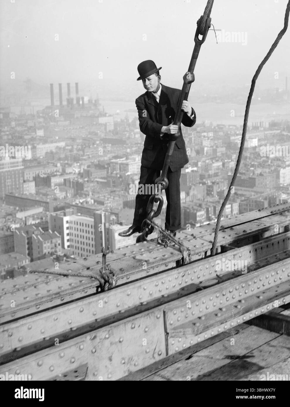 A photographer on the 33rd floor of the Metropolitan Tower while it is ...