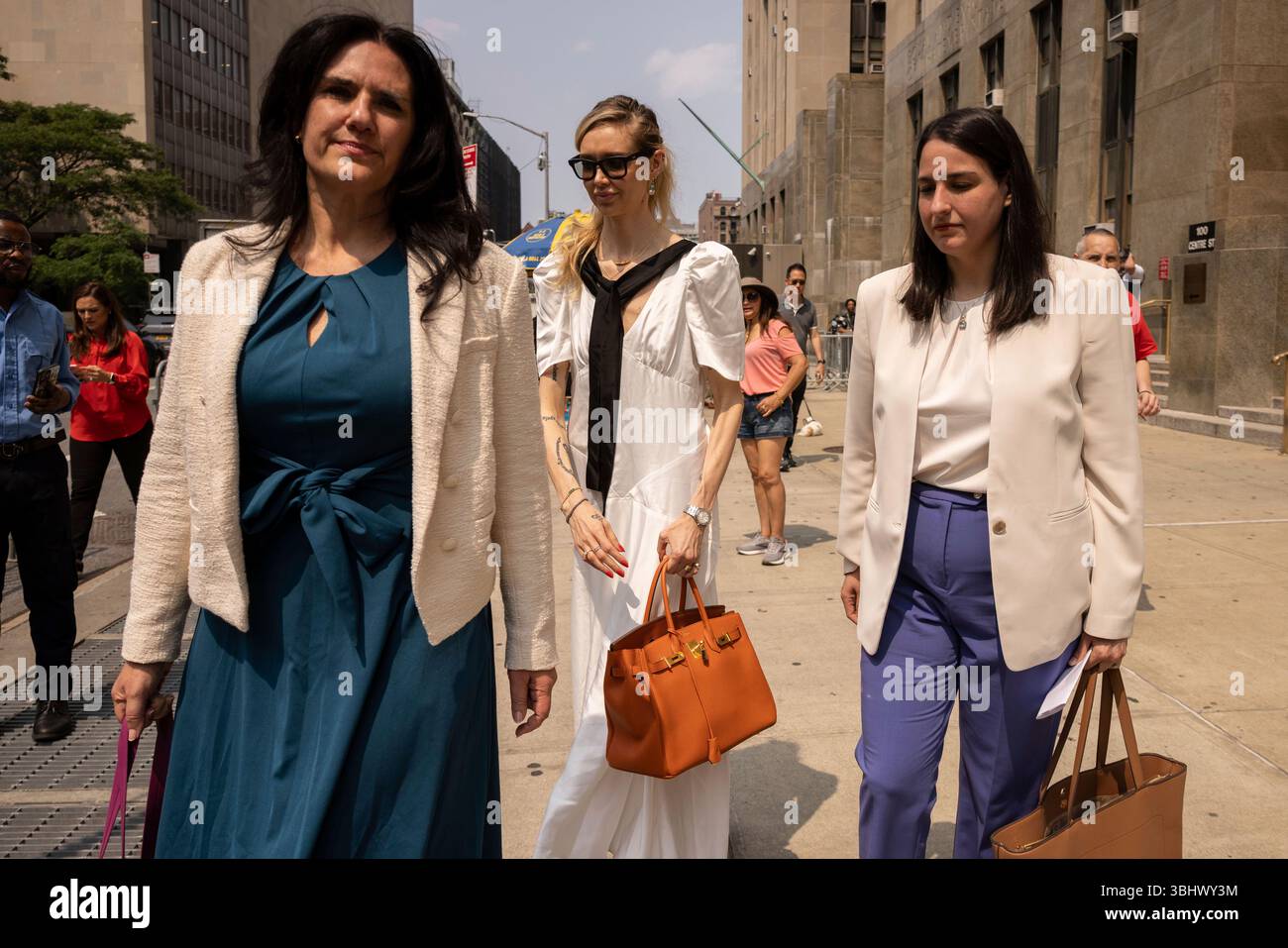 Kaja Sokola, center, attorney Lindsay Goldbrum, right, and attorney ...