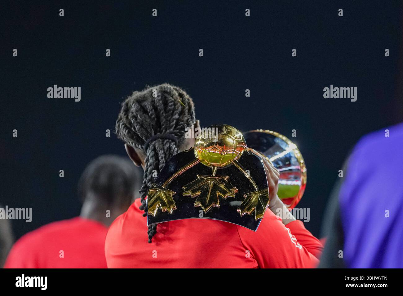 Toronto, Canada. 10th June, 2025. Ismael Koné #8 lifts the trophy after ...