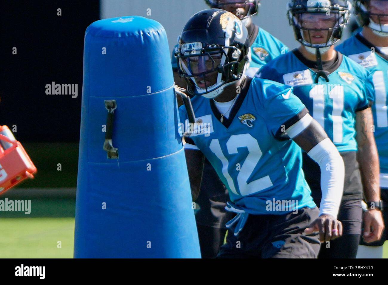 Jacksonville Jaguars wide receiver Travis Hunter (12) runs a drill ...