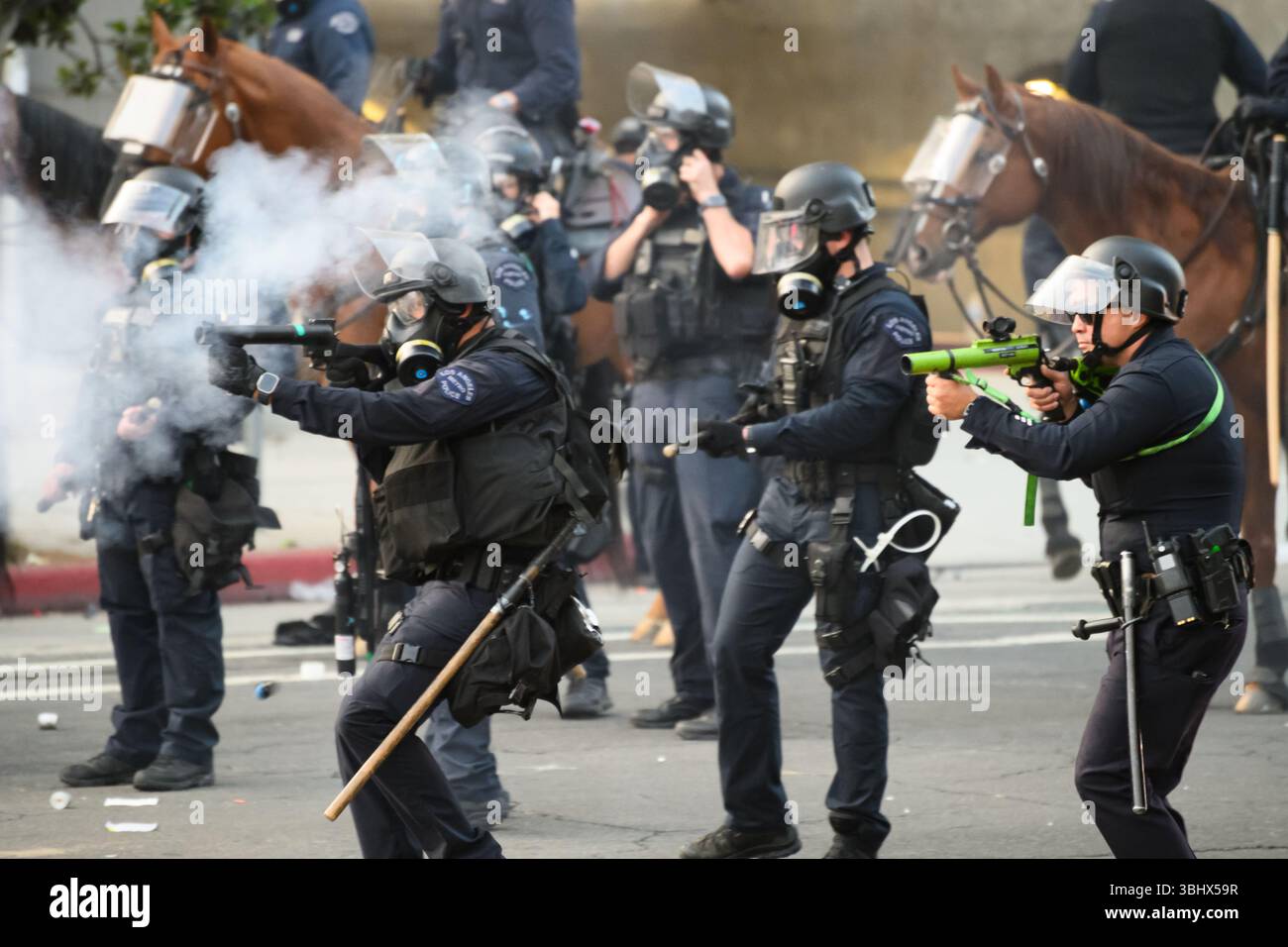 LAPD firing rubber bullets at protestors in front of the Los Angeles ...