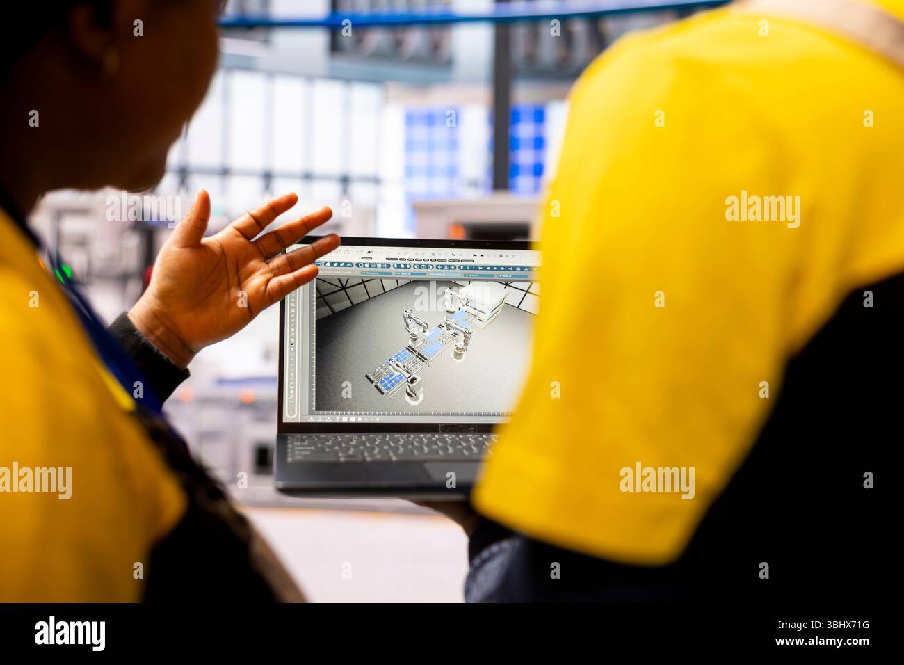 African american engineers use software for optimization of robotic ...