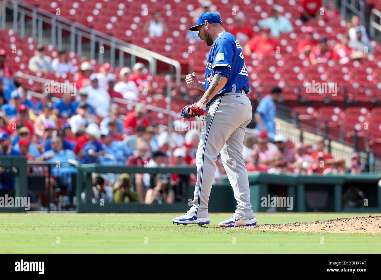 Toronto Blue Jays pitcher Yariel Rodríguez reacts after throwing for ...