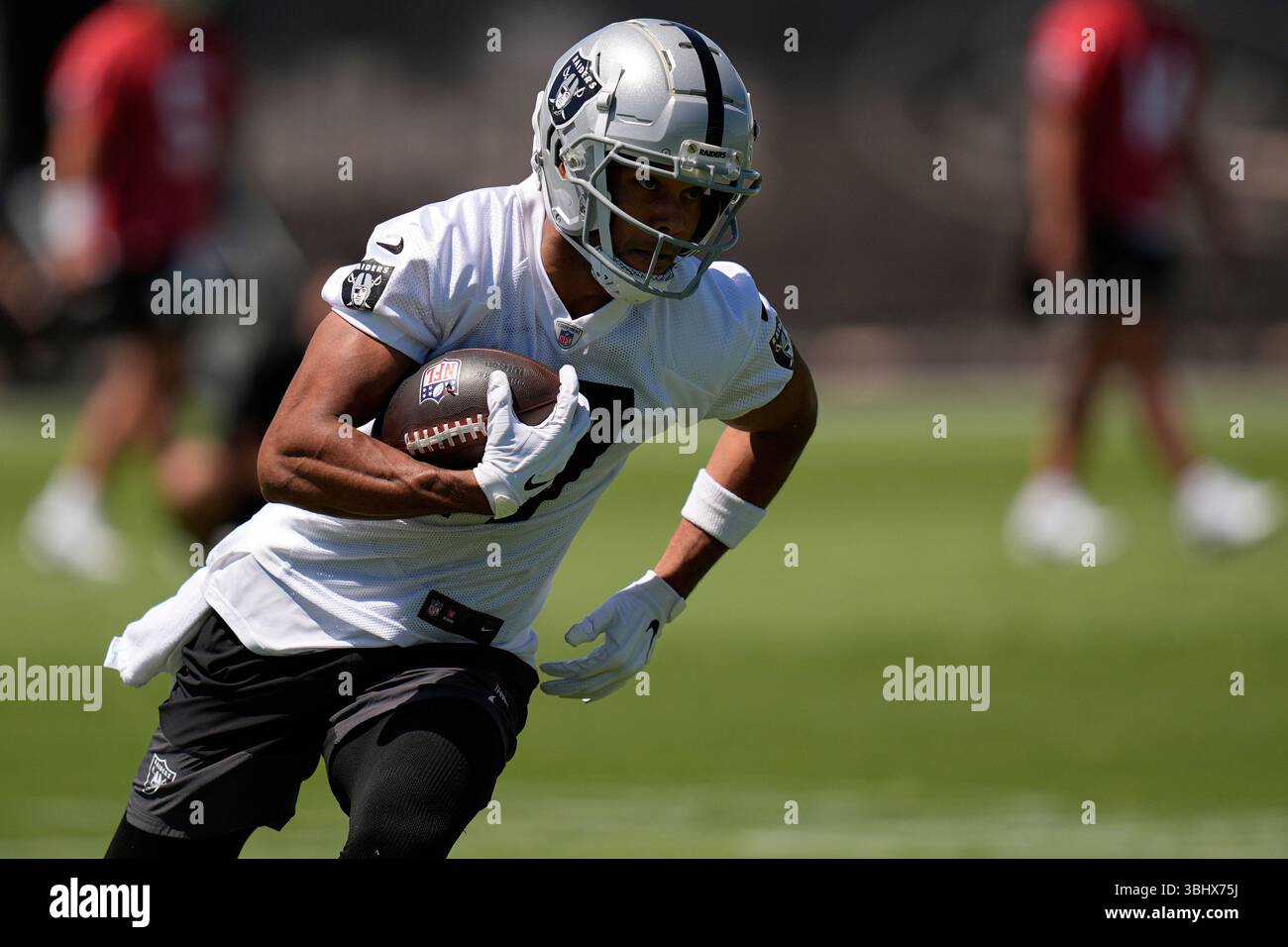Las Vegas Raiders wide receiver Collin Johnson participates during an ...