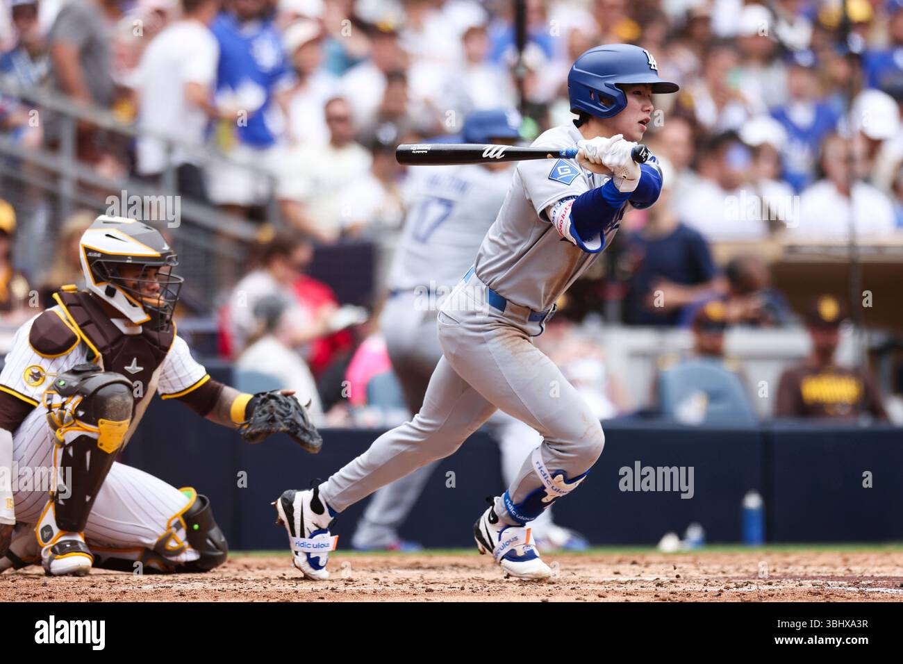 Los Angeles Dodgers' Hyeseong Kim grounds out to San Diego Padres' Jake ...