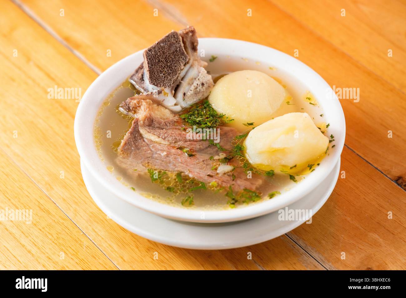 Beef rib broth with potatoes and cilantro - Traditional Colombian food ...