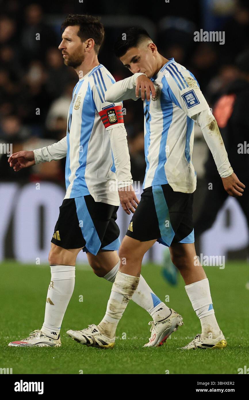 Argentina national team forwards Lionel Messi (L) and Thiago Almada ...