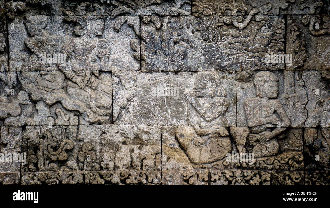The relief on the wall of Penataran Temple complex Stock Photo - Alamy