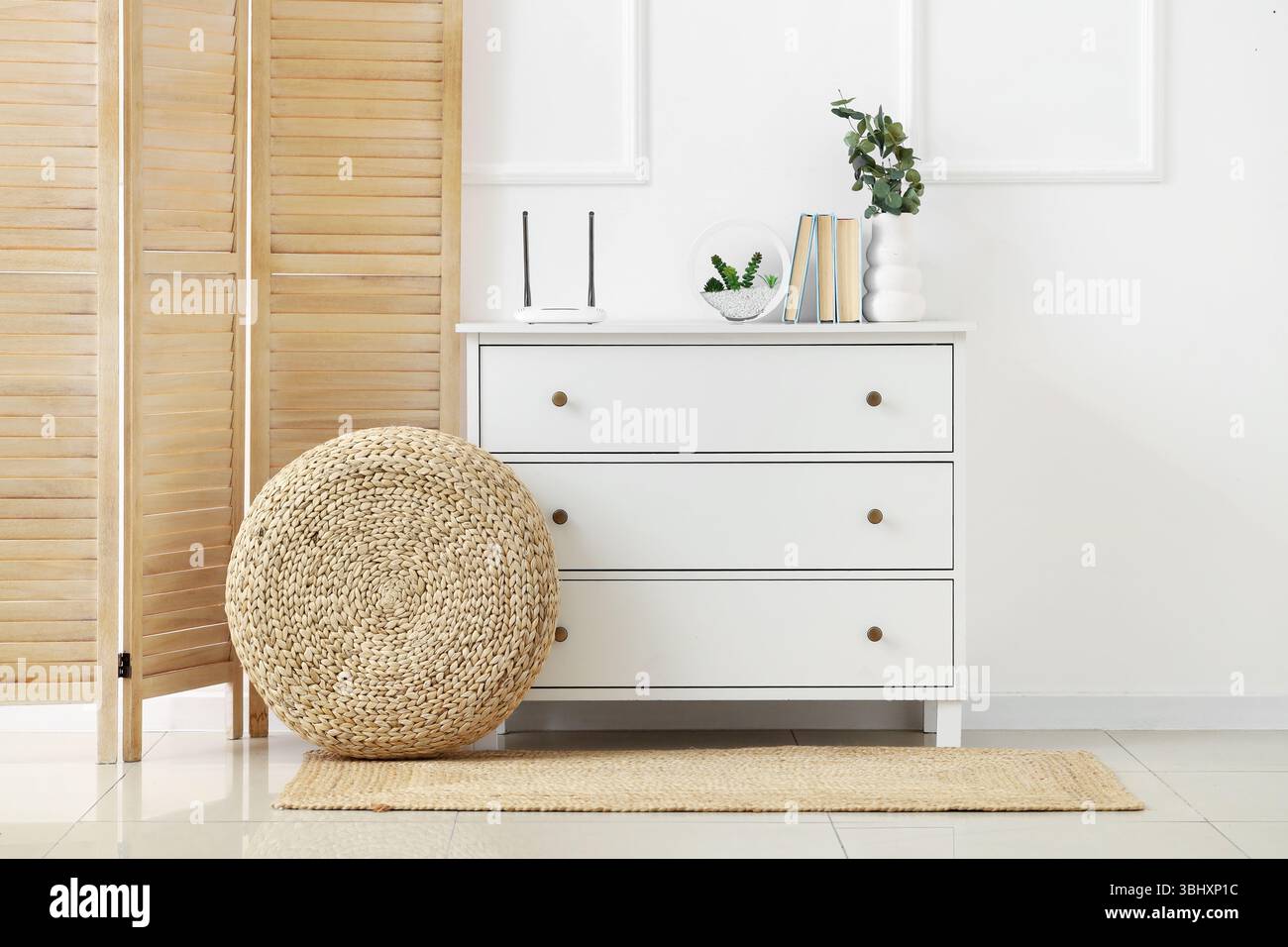 Interior of living room with wi-fi router on commode Stock Photo - Alamy