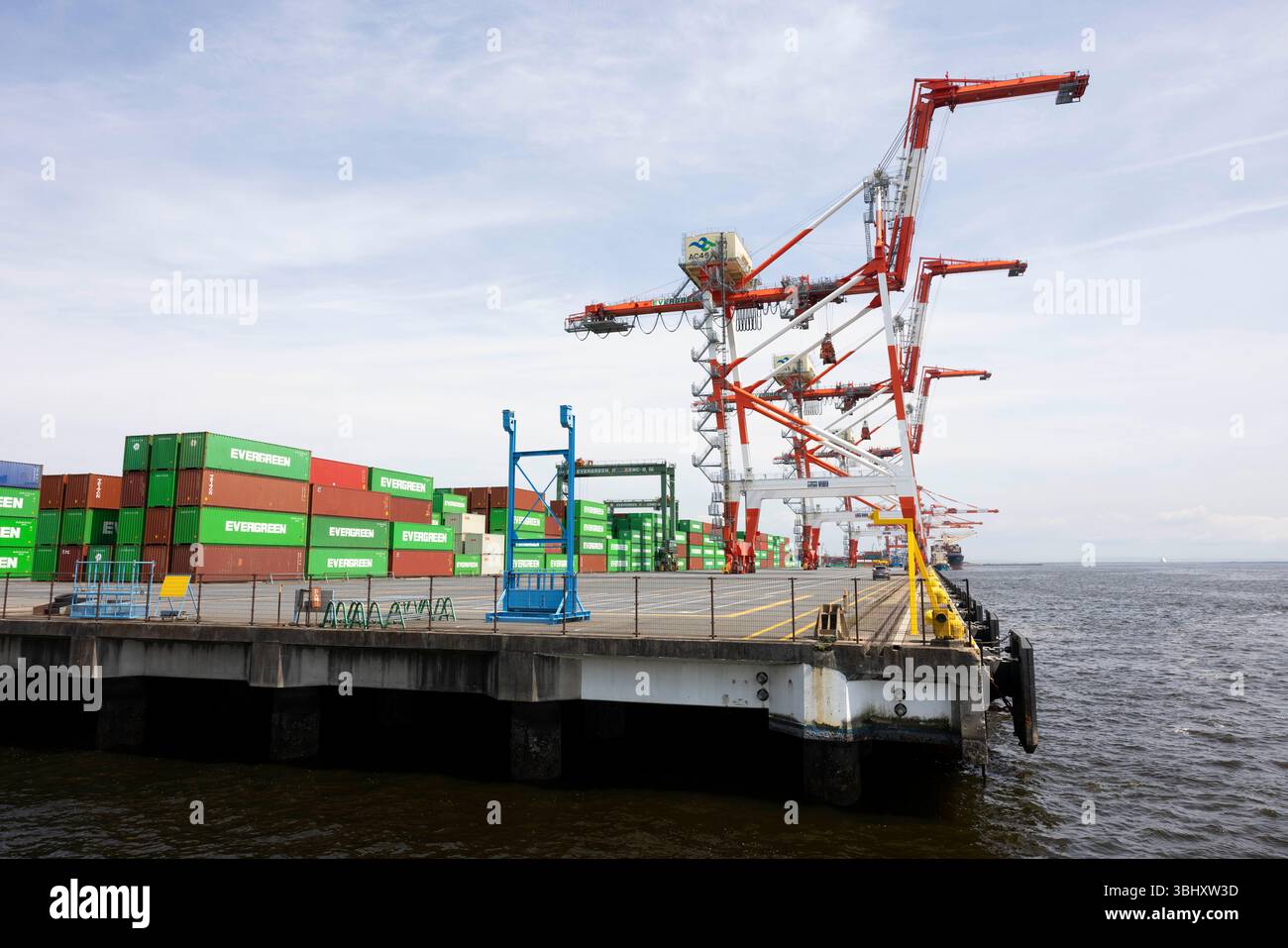 Tokyo, Japan. 14th May, 2025. Shipping container loading dock in Tokyo ...