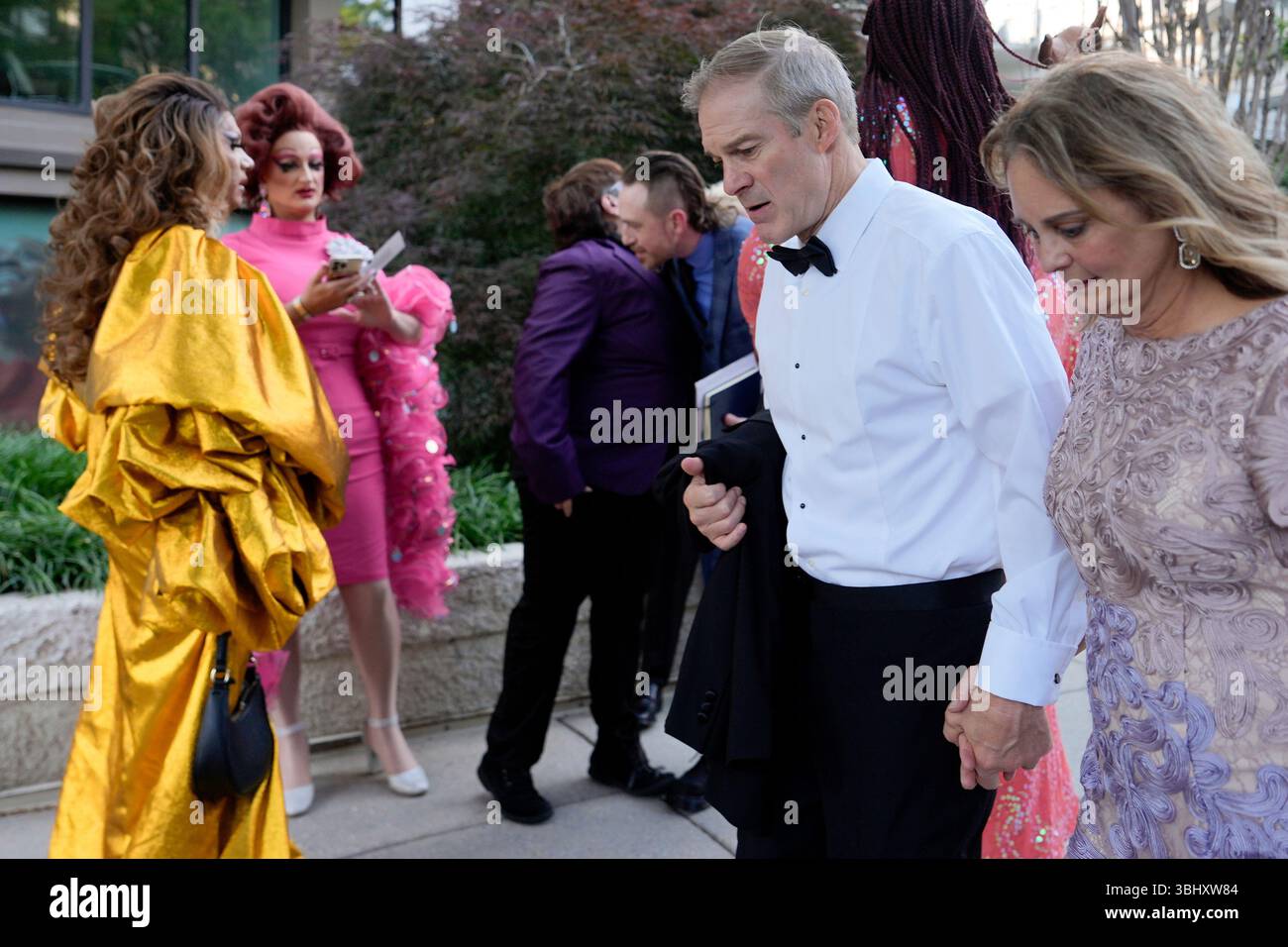 Rep. Jim Jordan, R-Ohio, and Polly Jordan walk past Tara Hoot, Ricky ...
