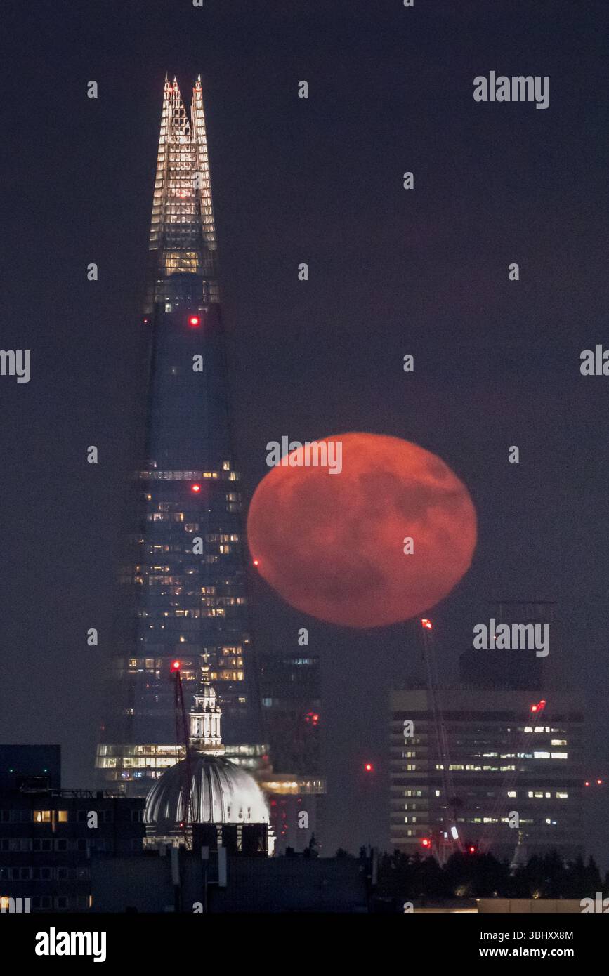 London, UK. 11th June 2025. UK Weather: Strawberry Moon at full 99.7% ...