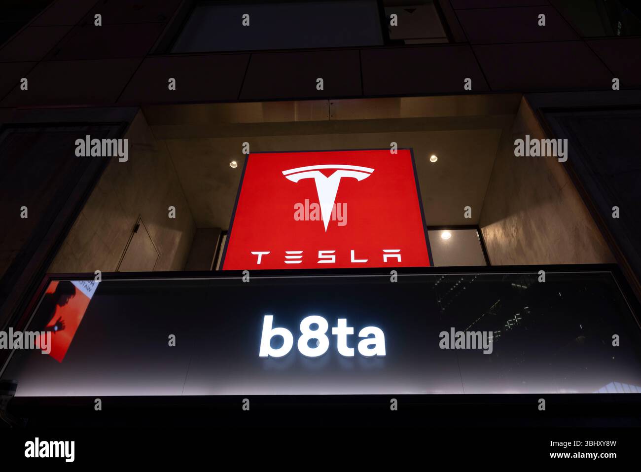 Tokyo, Japan. 25th Apr, 2025. Tesla Logo above a Tesla pop-up store in ...