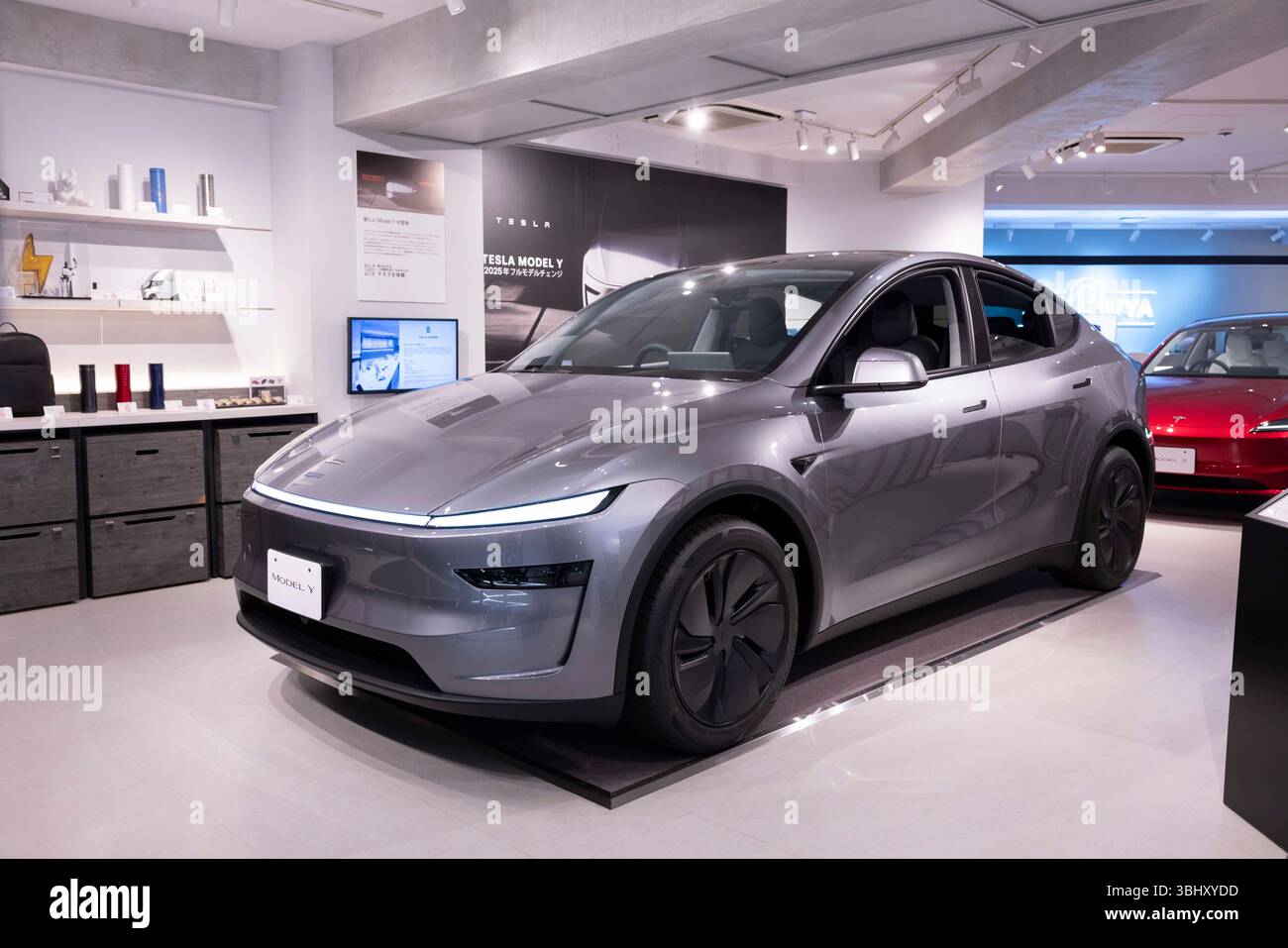 Tokyo, Japan. 25th Apr, 2025. Tesla model Y on display inside a Tesla ...