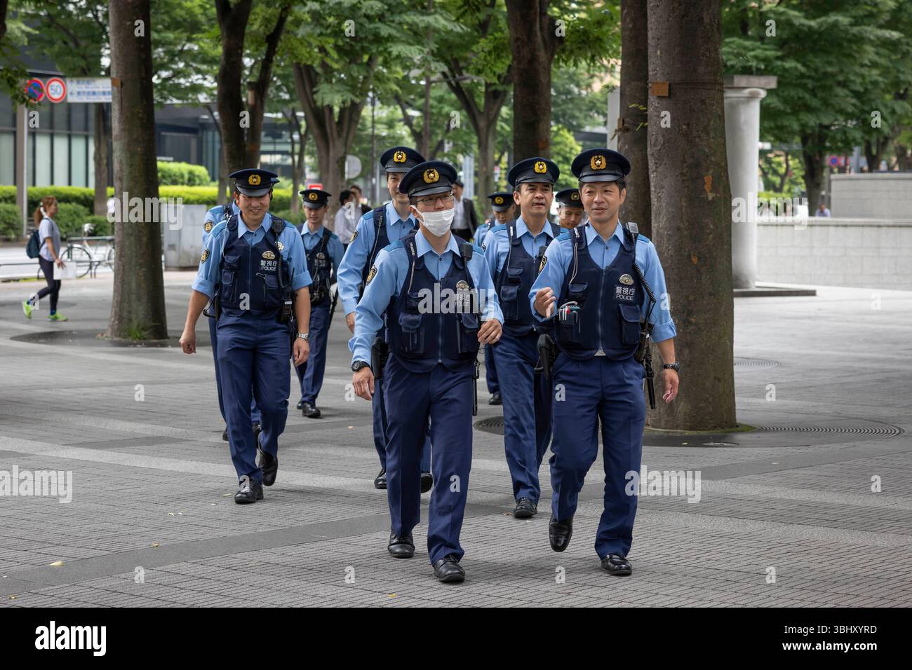 Tokyo, Japan. 29th May, 2025. Japanese police officers walk in the ...
